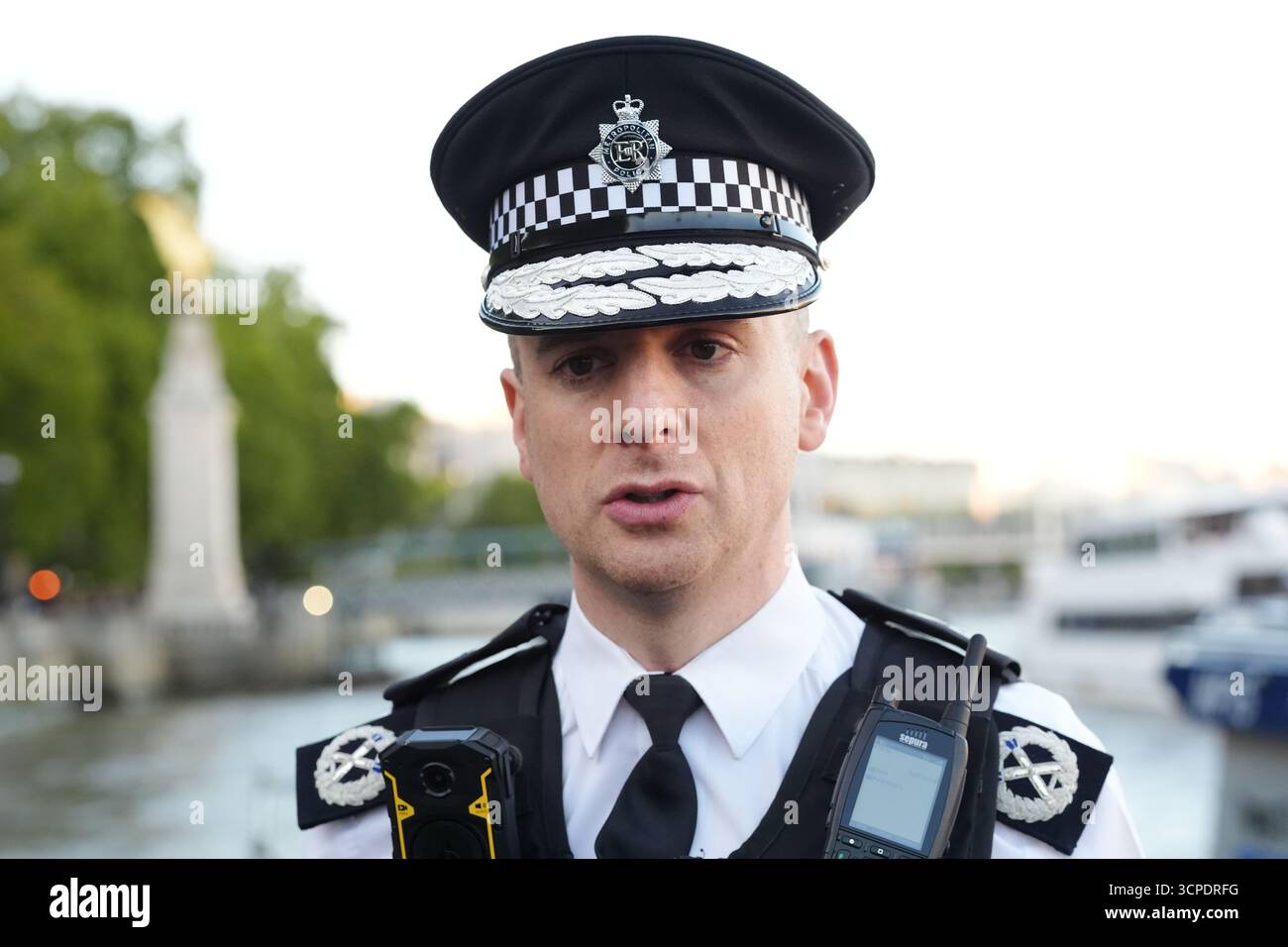 EMBARGOED TO 0001 FRIDAY SEPTEMBER 26 Deputy Assistant Commissioner Ben Russell speaking after a ...