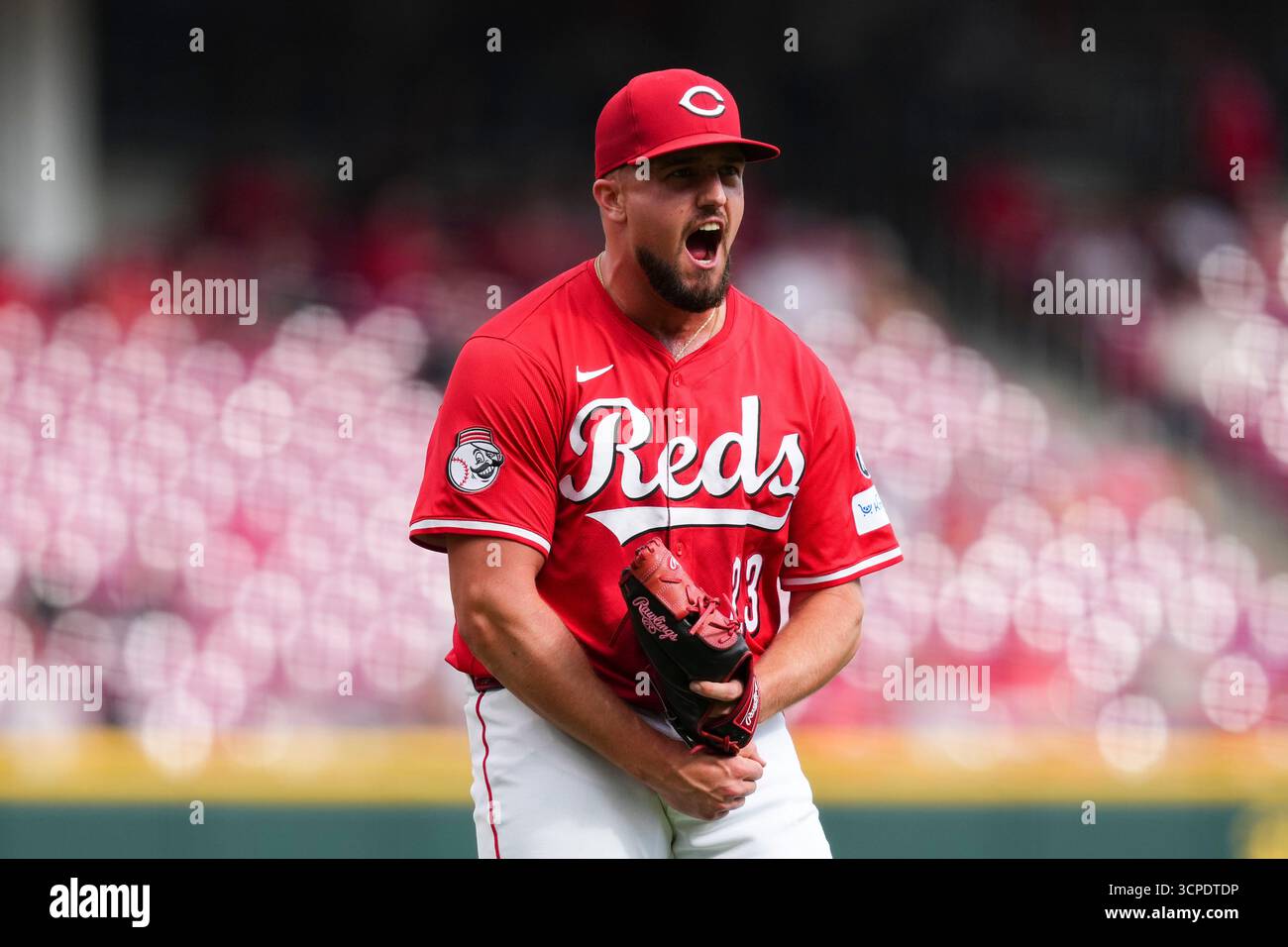 Cincinnati Reds pitcher Graham Ashcraft reacts after striking out ...