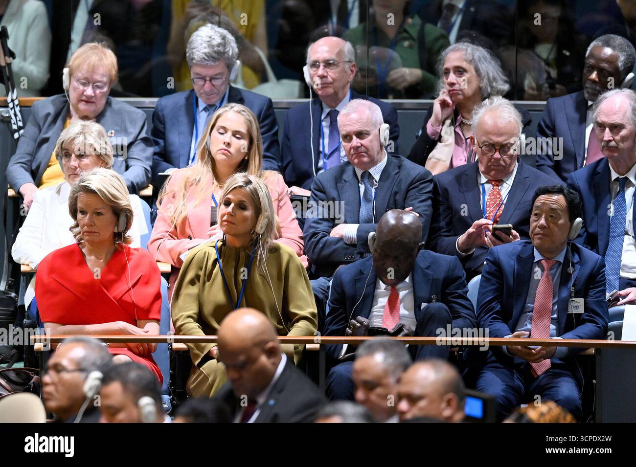 (L-R) Queen Mathilde (red) of Belgium and Queen Maxima (green) of the ...