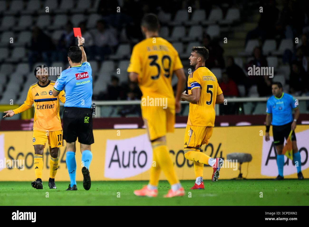 Juan Cuadrado of Pisa SC is shown a red card by referee Ivano Pezzuto ...