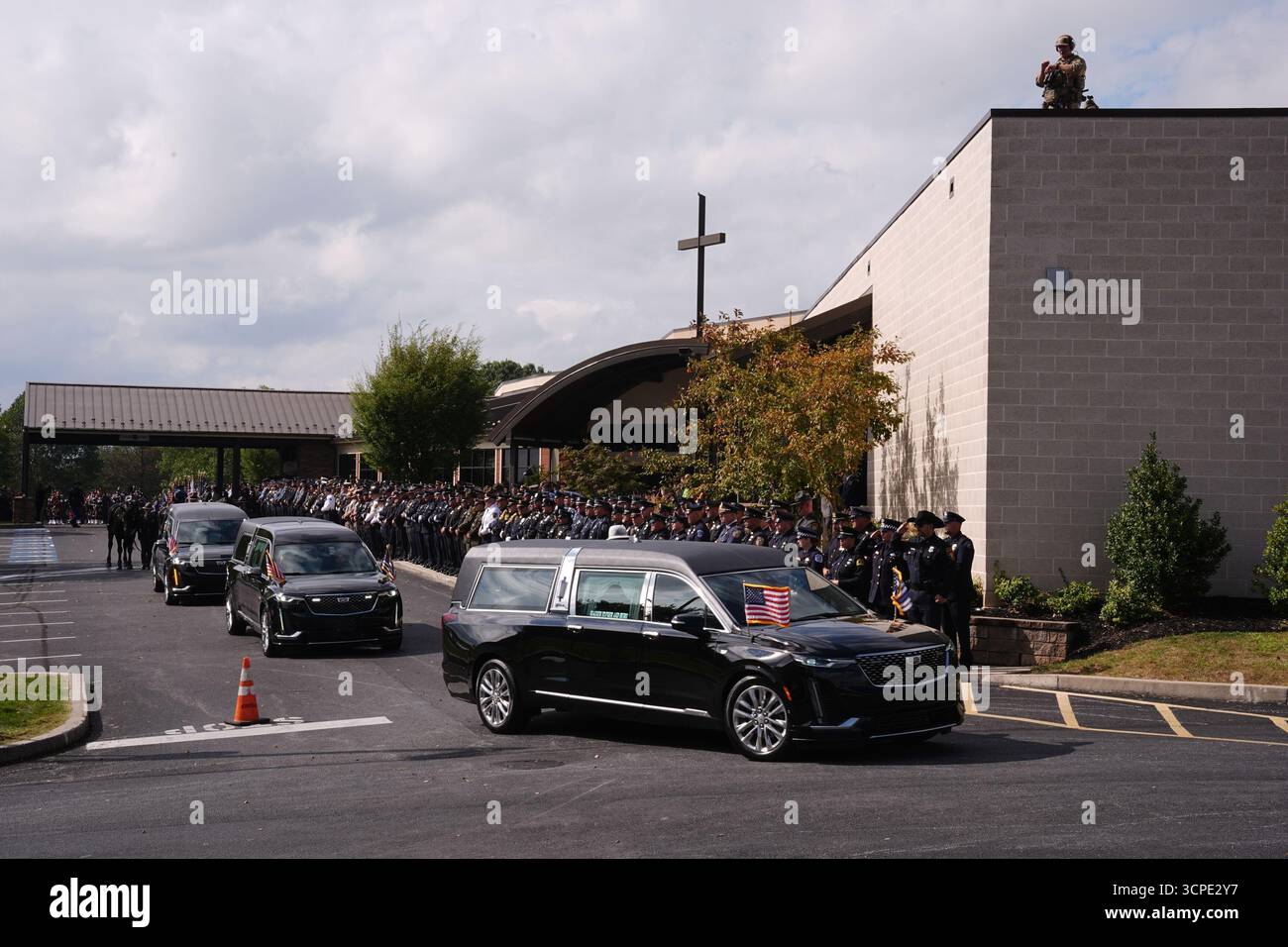 Officers gather at the conclusion of funeral services for slain ...