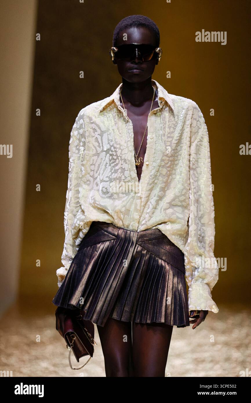 A model walks the runway at the Roberto Cavalli fashion show during ...