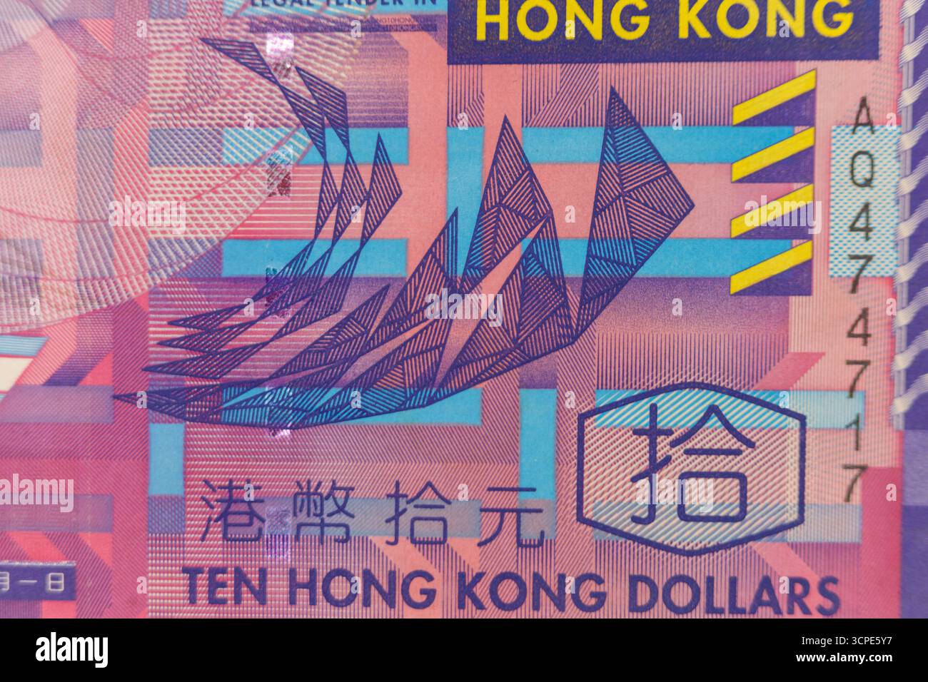 Close-up of a Hong Kong ten dollar bill. Features geometric designs ...