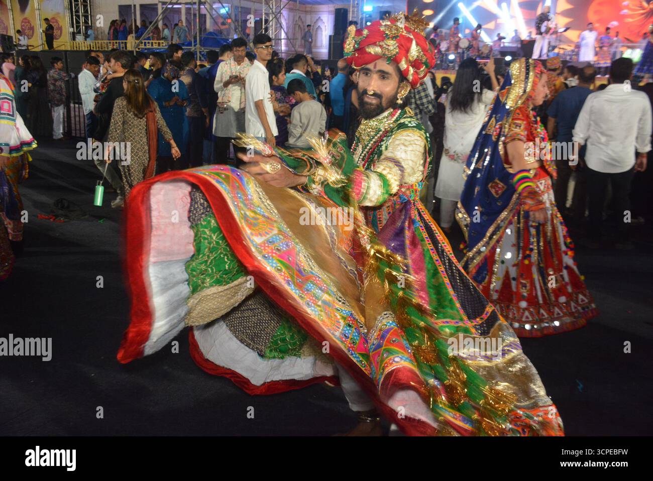THANE, INDIA - SEPTEMBER 24: Dressed in colorful traditional attire ...