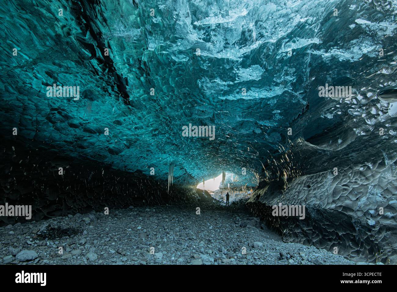 Crystal blue ice caves at Breiðamerkurjökull on both sides of ...