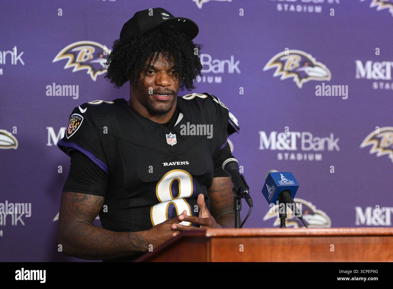 Baltimore Ravens quarterback Lamar Jackson (8) talks to reporters ...