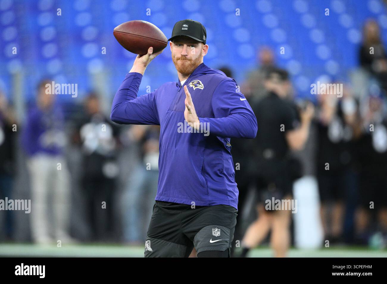 Baltimore Ravens quarterback Cooper Rush (15) warms up before an NFL ...