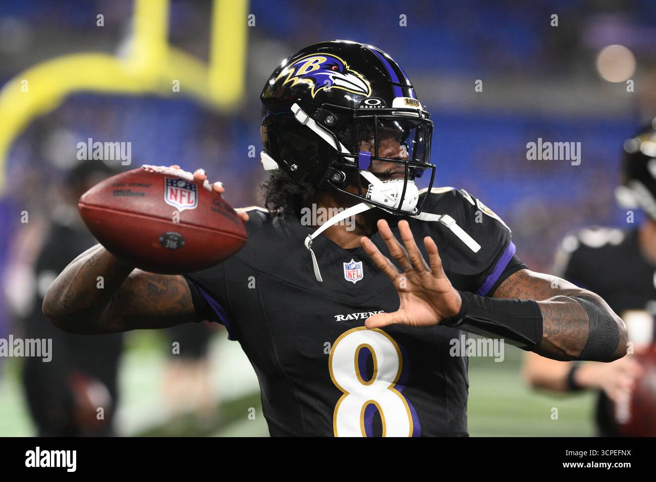Baltimore Ravens quarterback Lamar Jackson (8) warms up before an NFL ...