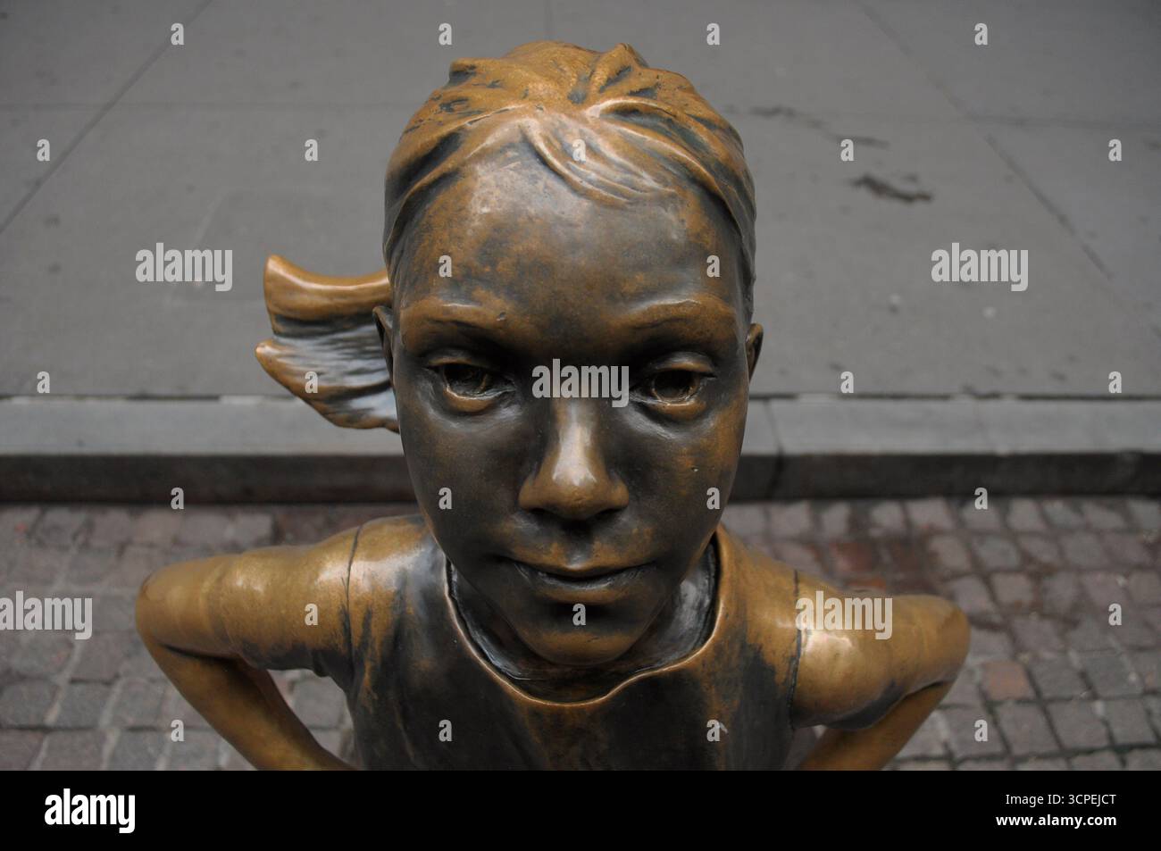 The "Fearless Girl" statue is seen in front of the New York Stock ...