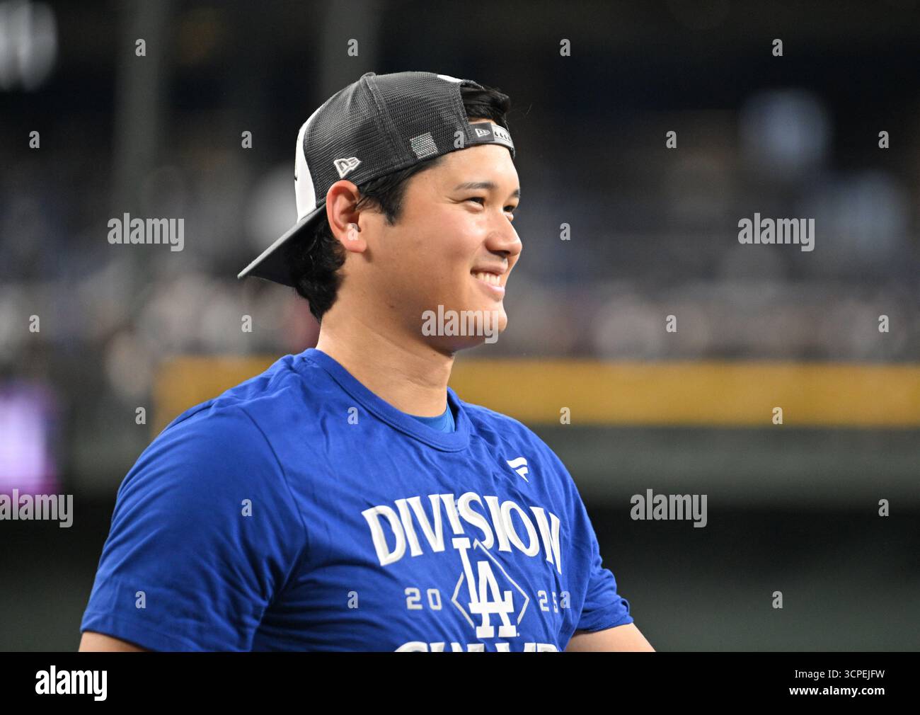 Los Angeles Dodgers' Shohei Ohtani smiles after winning an MLB game ...