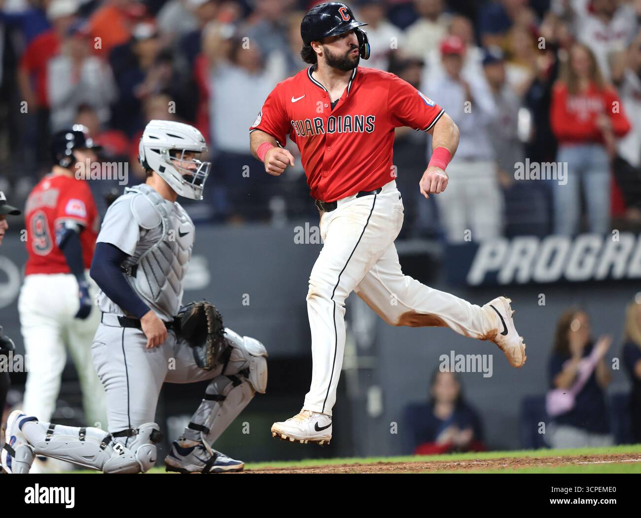 Cleveland Guardians Austin Hedges (27) scores a run in the eighth ...