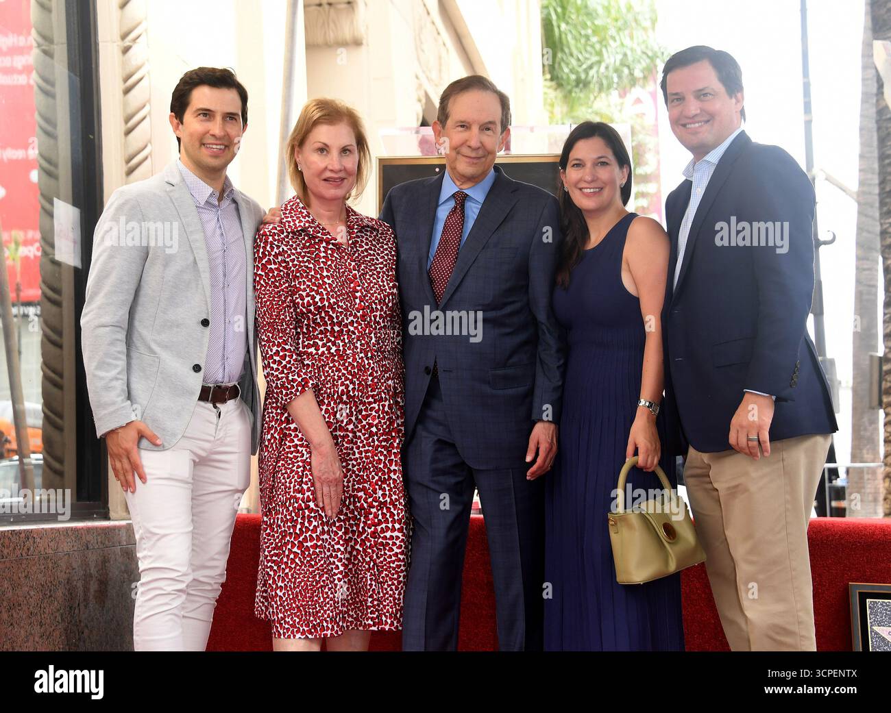 Television Journalist Chris Wallace (center) poses with his wife and ...