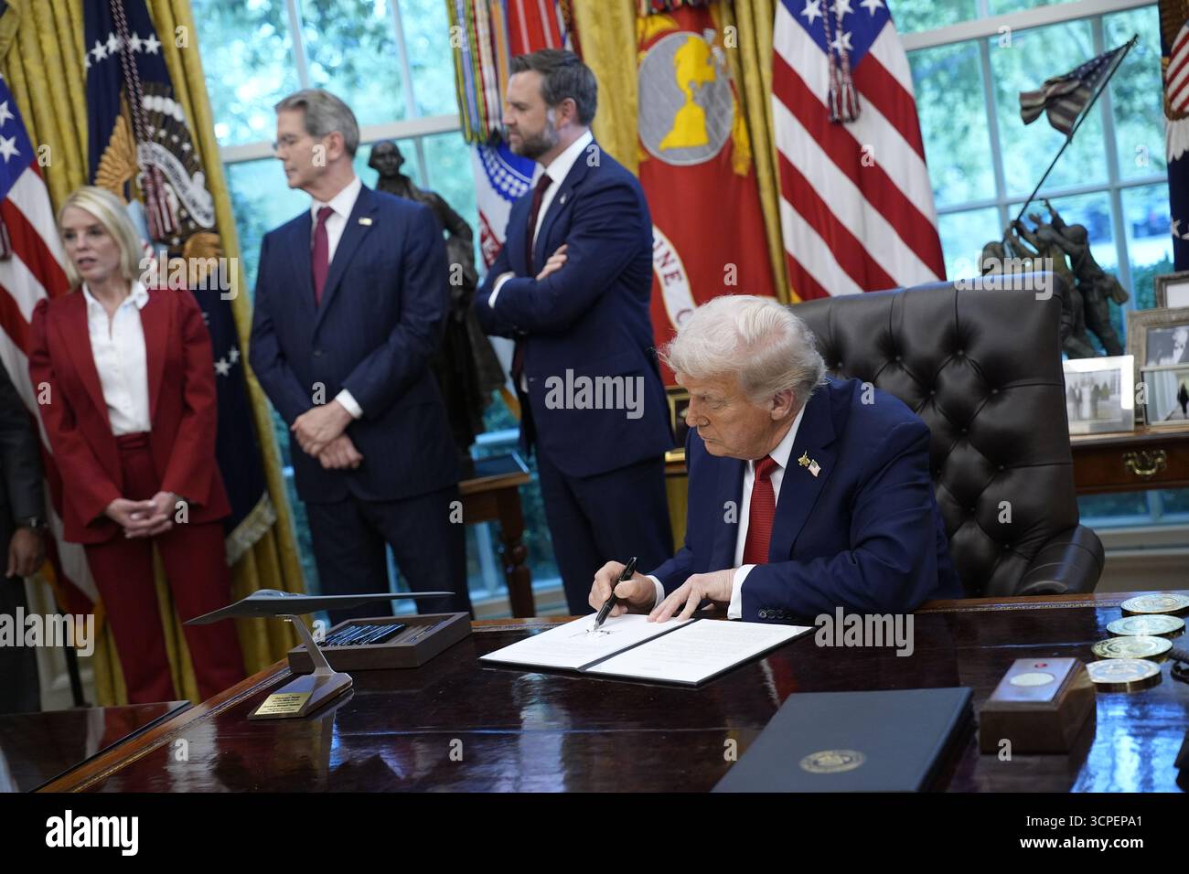 United States President Donald J Trump signs executive orders in the ...