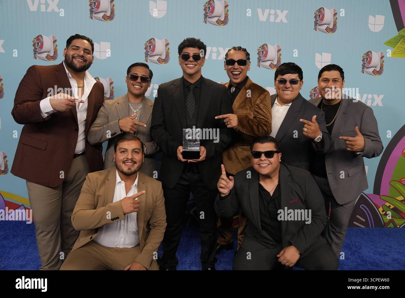 Mexican band Grupo Firme poses after winning the Best Mexican Banda ...