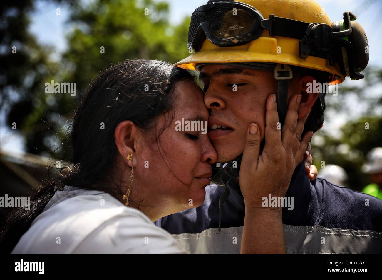Yuliana Andrea Agudelo embraces her son Sebastian Agudelo after he was ...
