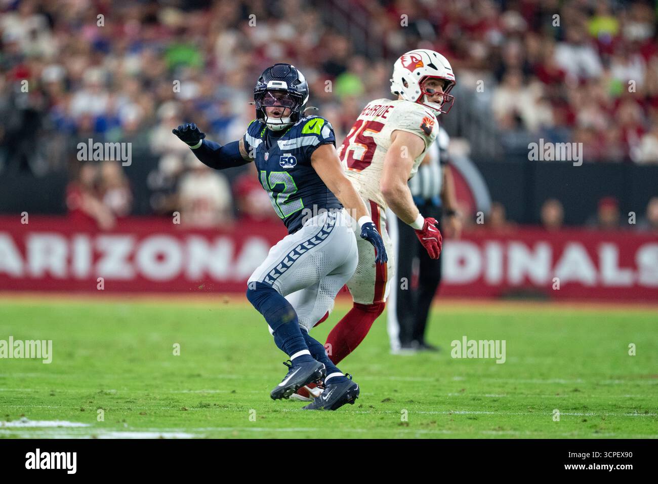 Arizona Cardinals tight end Trey McBride (85) runs past Seattle ...