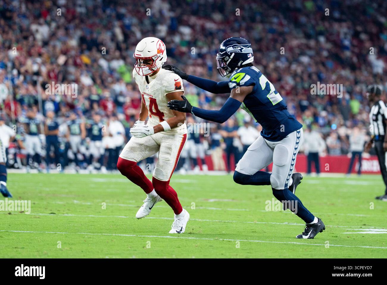 Arizona Cardinals wide receiver Michael Wilson (14) runs past Seattle ...