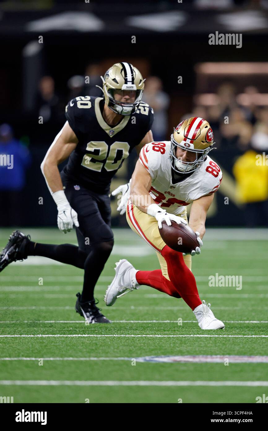 San Francisco 49ers tight end Jake Tonges (88) is defended by New ...