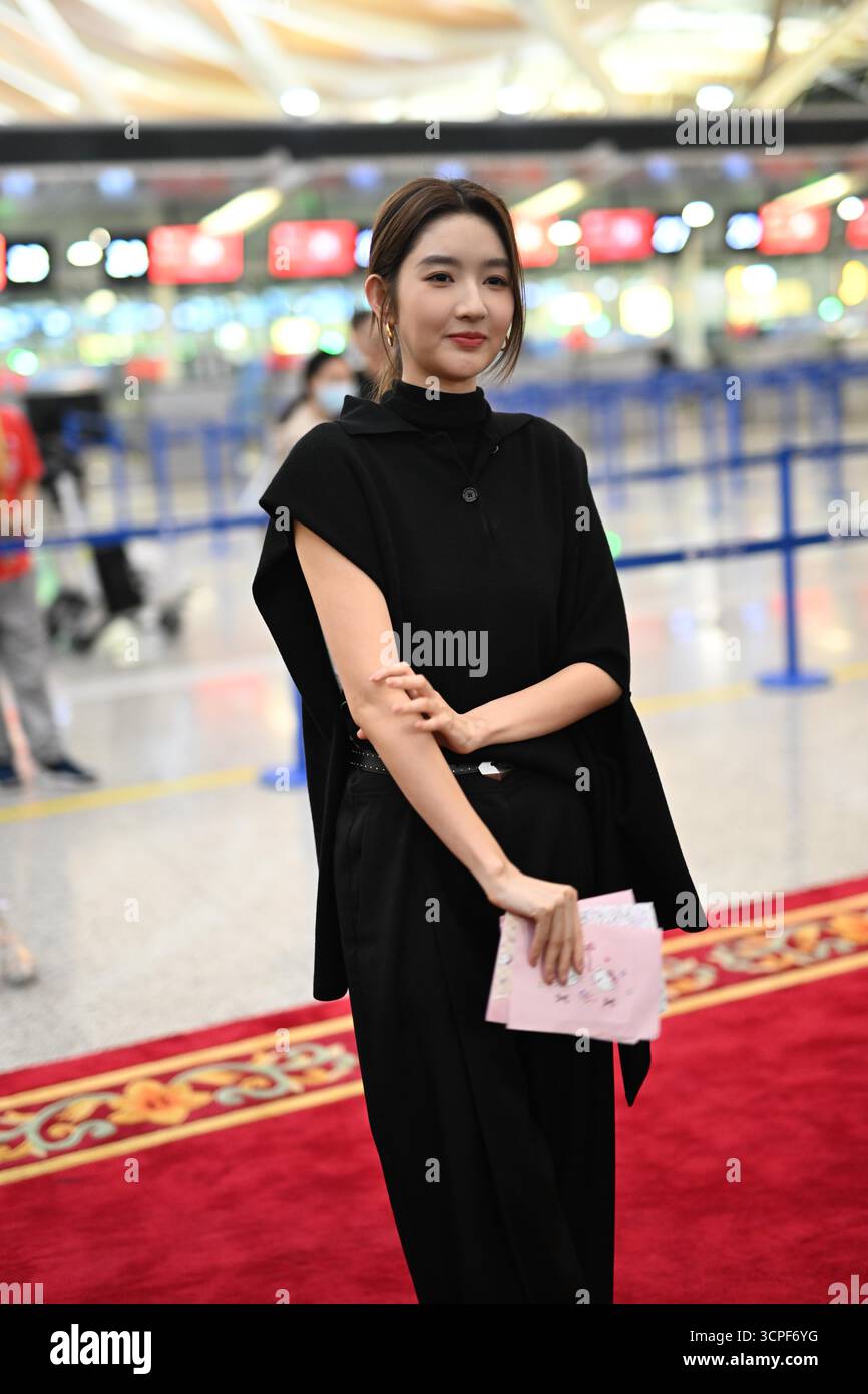Chinese actress Wang Yuwen appears at the airport in Shanghai, China ...