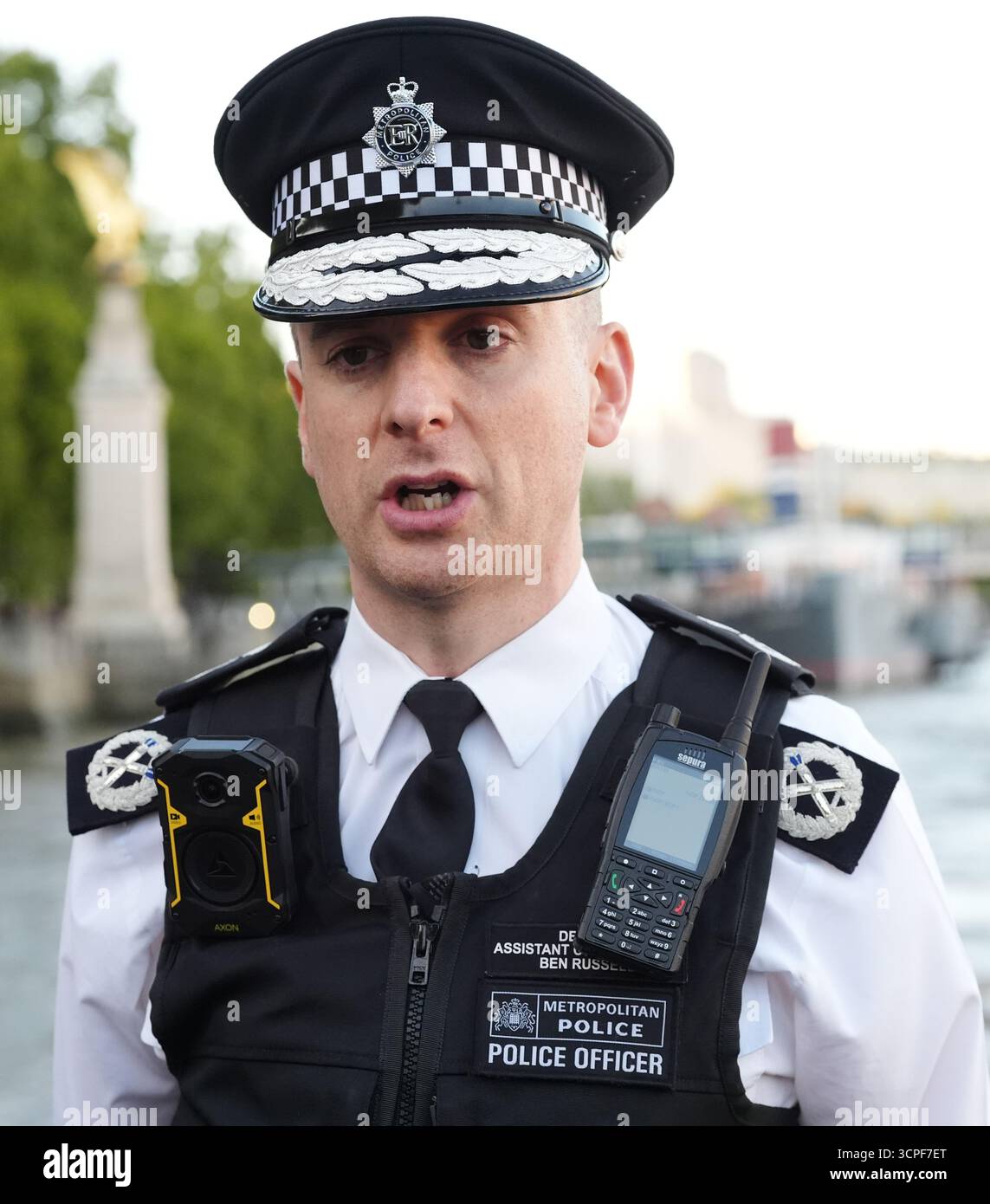 Deputy Assistant Commissioner Ben Russell speaking after a briefing by ...