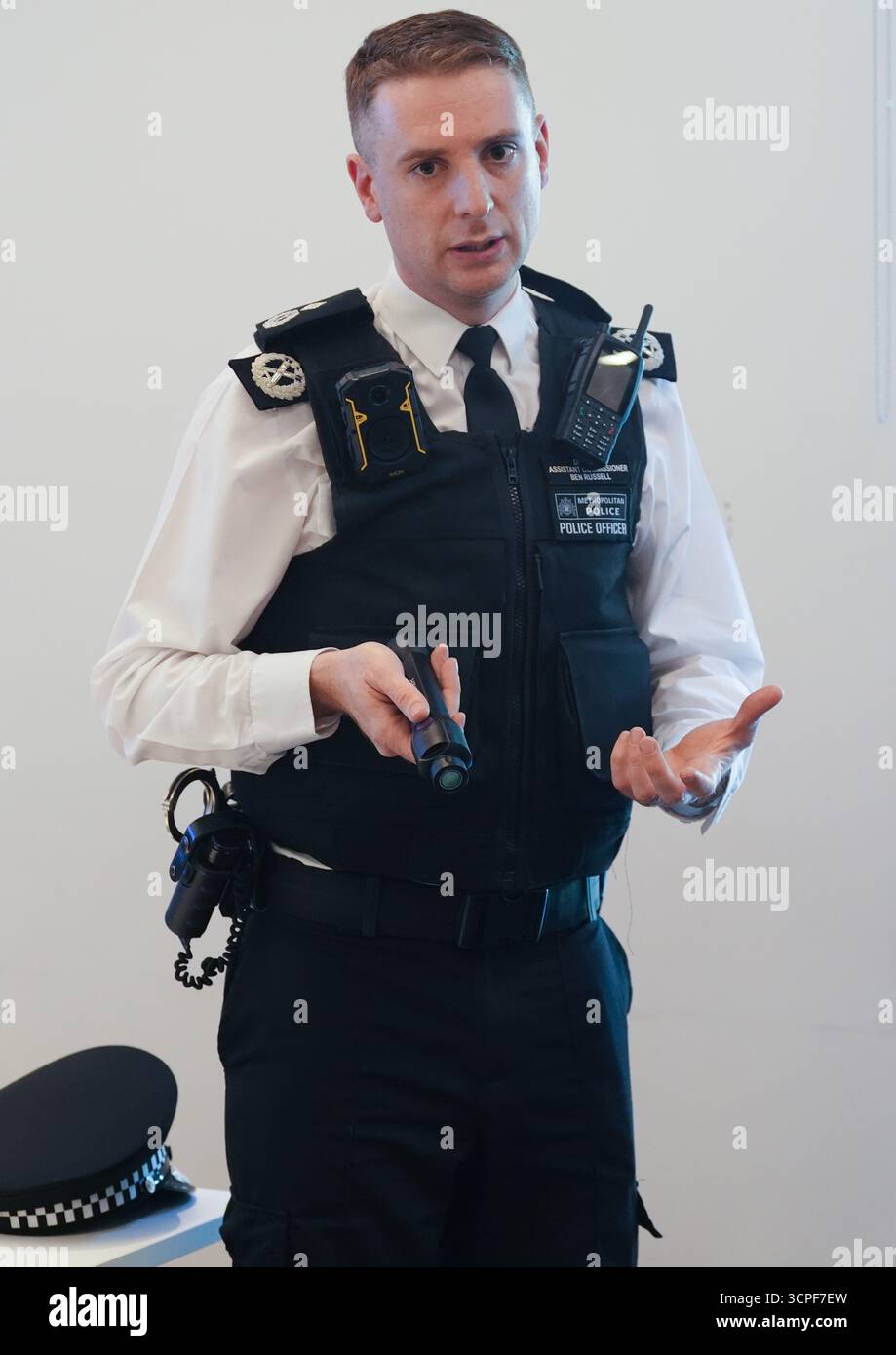 Deputy Assistant Commissioner Ben Russell speaking during a briefing by ...