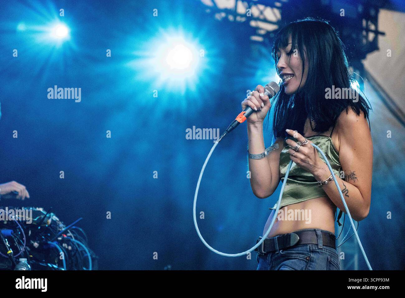September 25, 2025: Ami Komai vocalist with Kumo 99 performing at the ...
