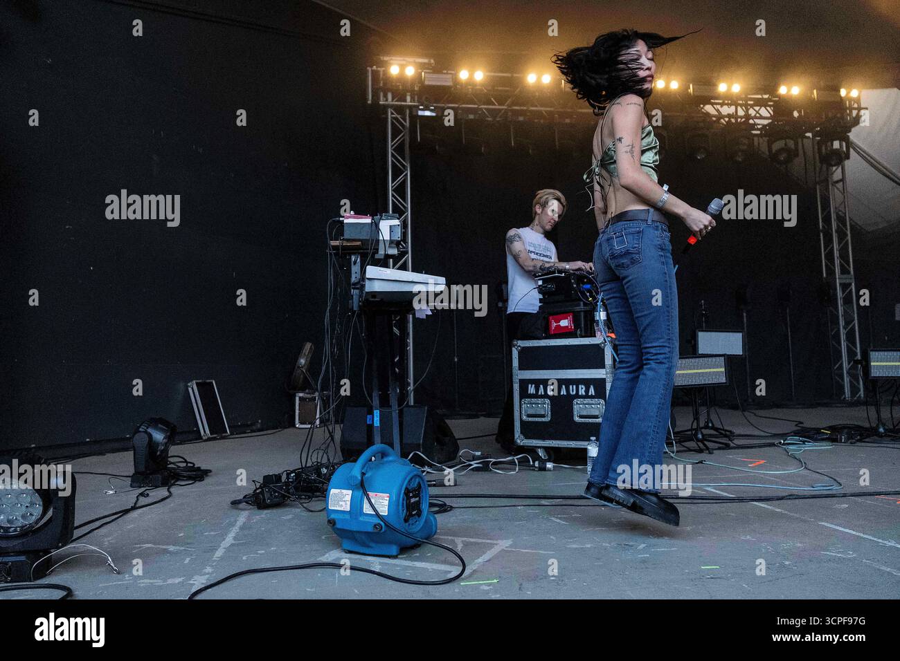 September 25, 2025: Ami Komai vocalist with Kumo 99 performing at the ...