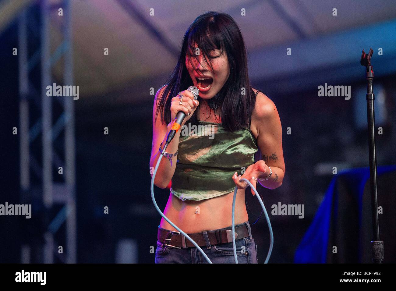 September 25, 2025: Ami Komai vocalist with Kumo 99 performing at the ...