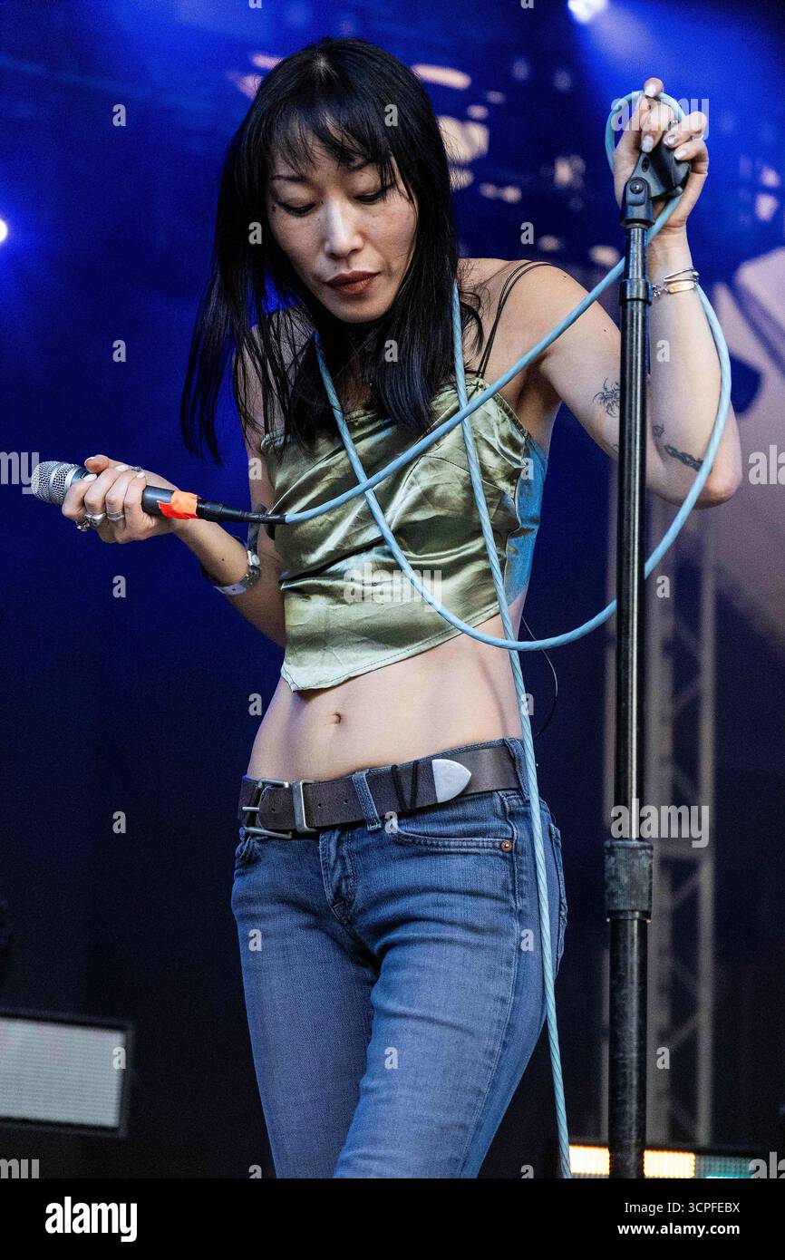 September 25, 2025: Ami Komai vocalist with Kumo 99 performing at the ...