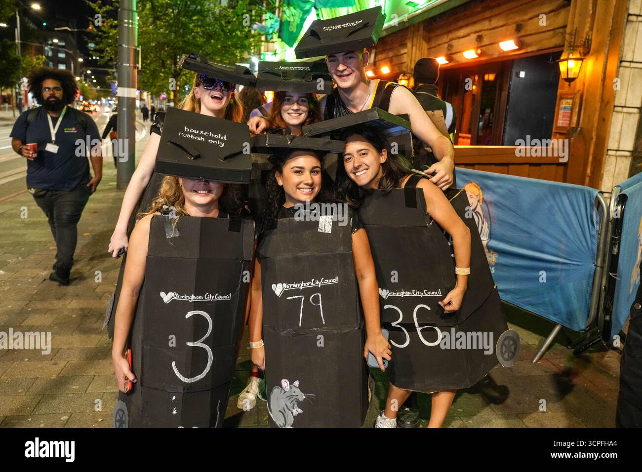 Broad Street, Birmingham, 25th September 2025 - Students wear wheelie ...