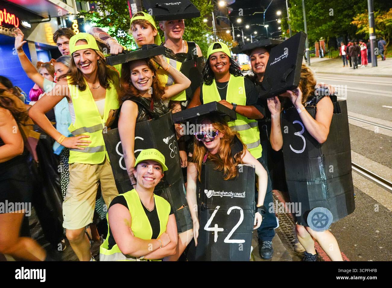 Broad Street, Birmingham, 25th September 2025 - Students wear wheelie ...