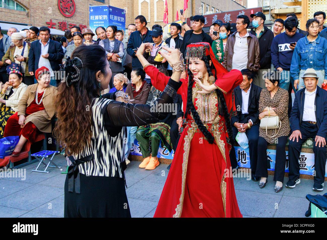 Tourists visit the Grand Bazaar in Urumqi City, northwest China's ...