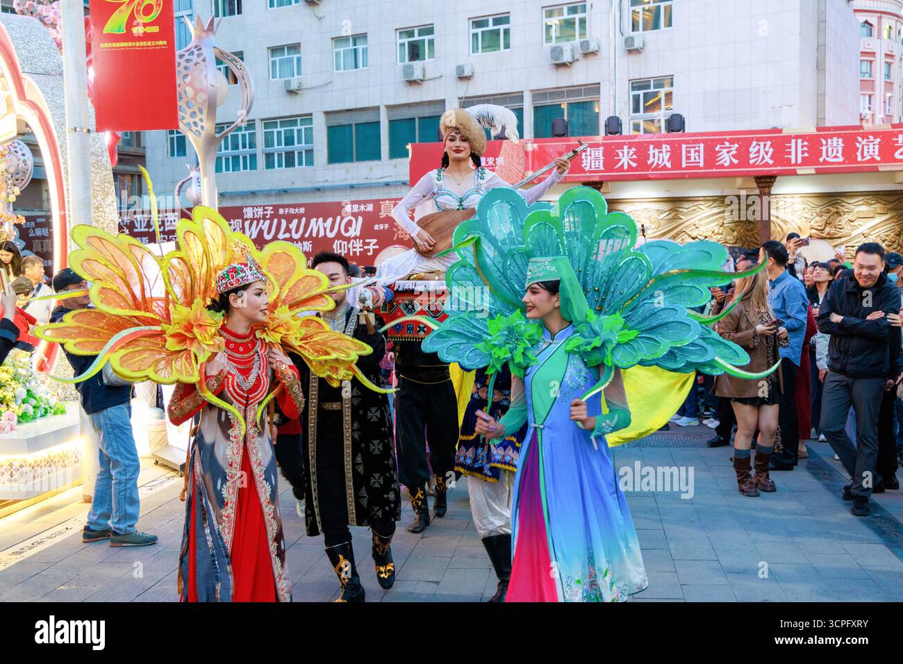 Tourists visit the Grand Bazaar in Urumqi City, northwest China's ...