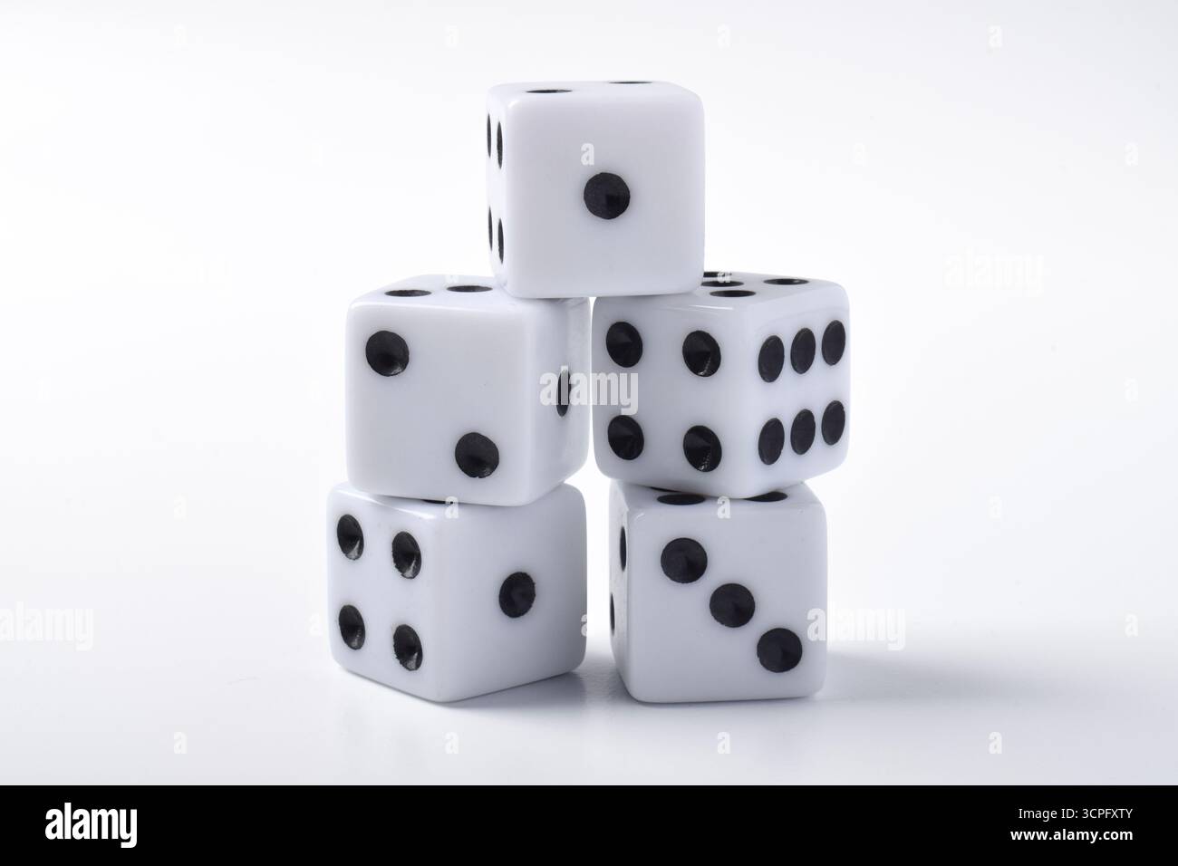 Five white dice on white background, symbolizing luck, chance ...