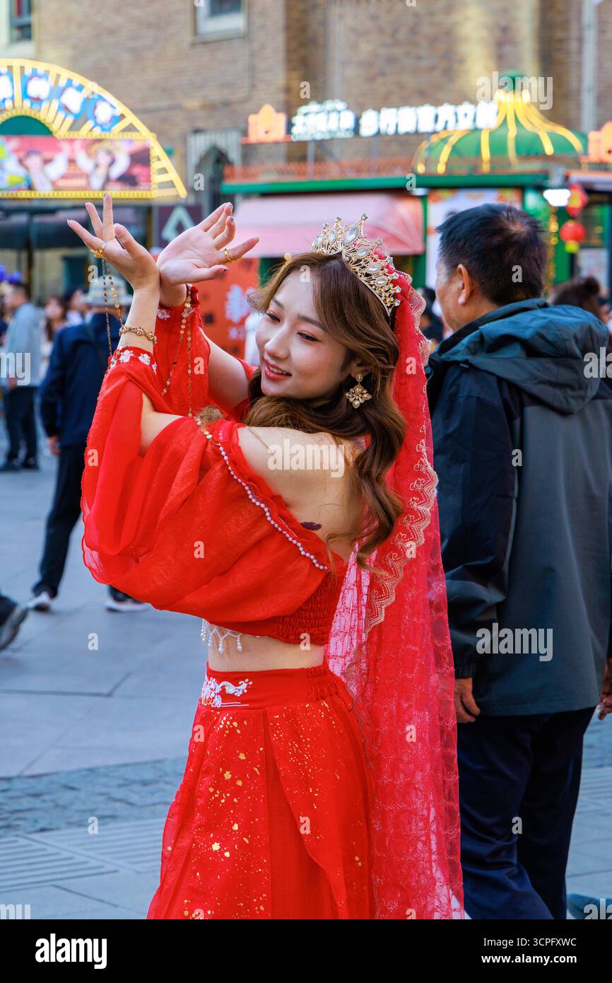 Tourists visit the Grand Bazaar in Urumqi City, northwest China's ...