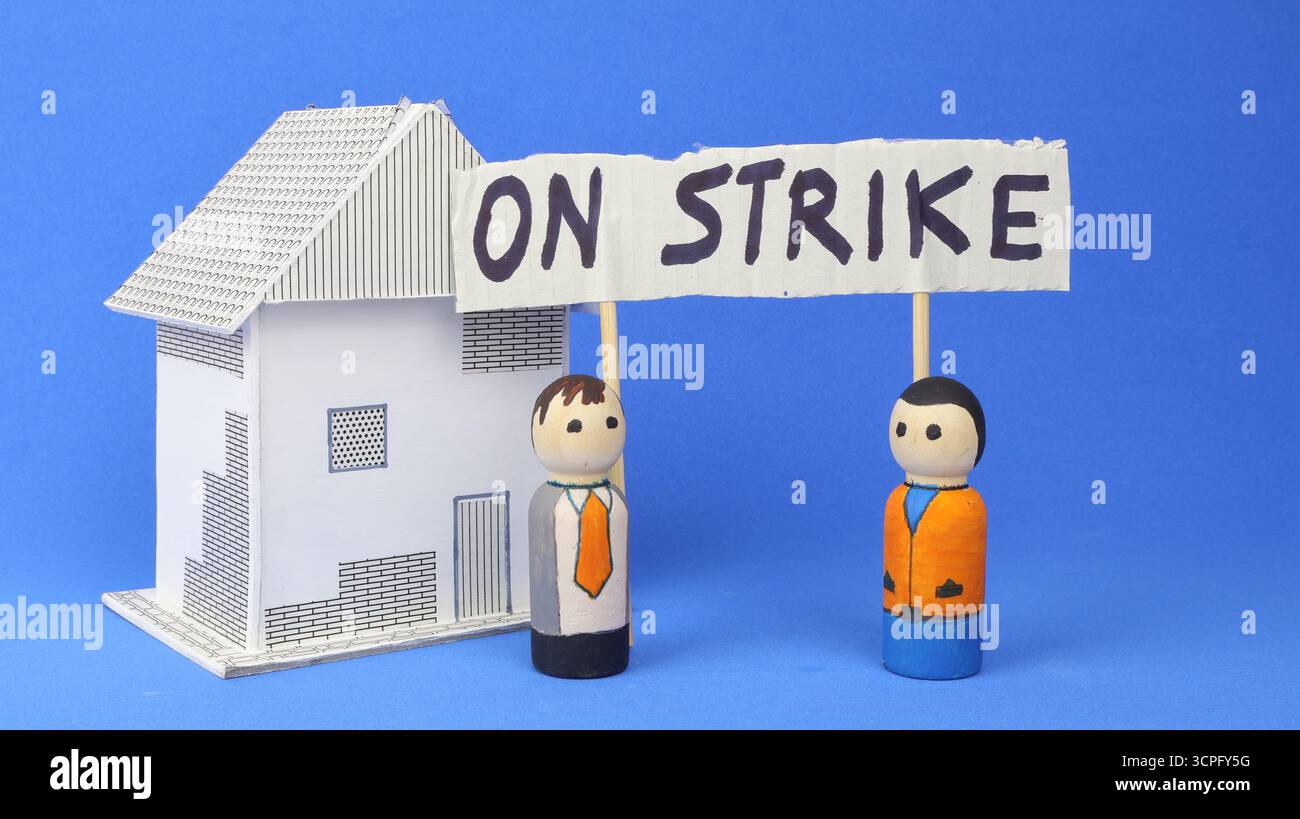 Strike written on a protest sign with a blue background. Demonstration ...