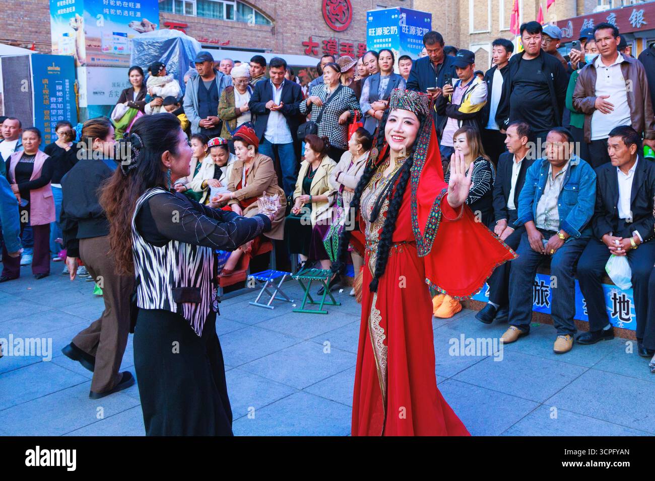 Tourists visit the Grand Bazaar in Urumqi City, northwest China's ...