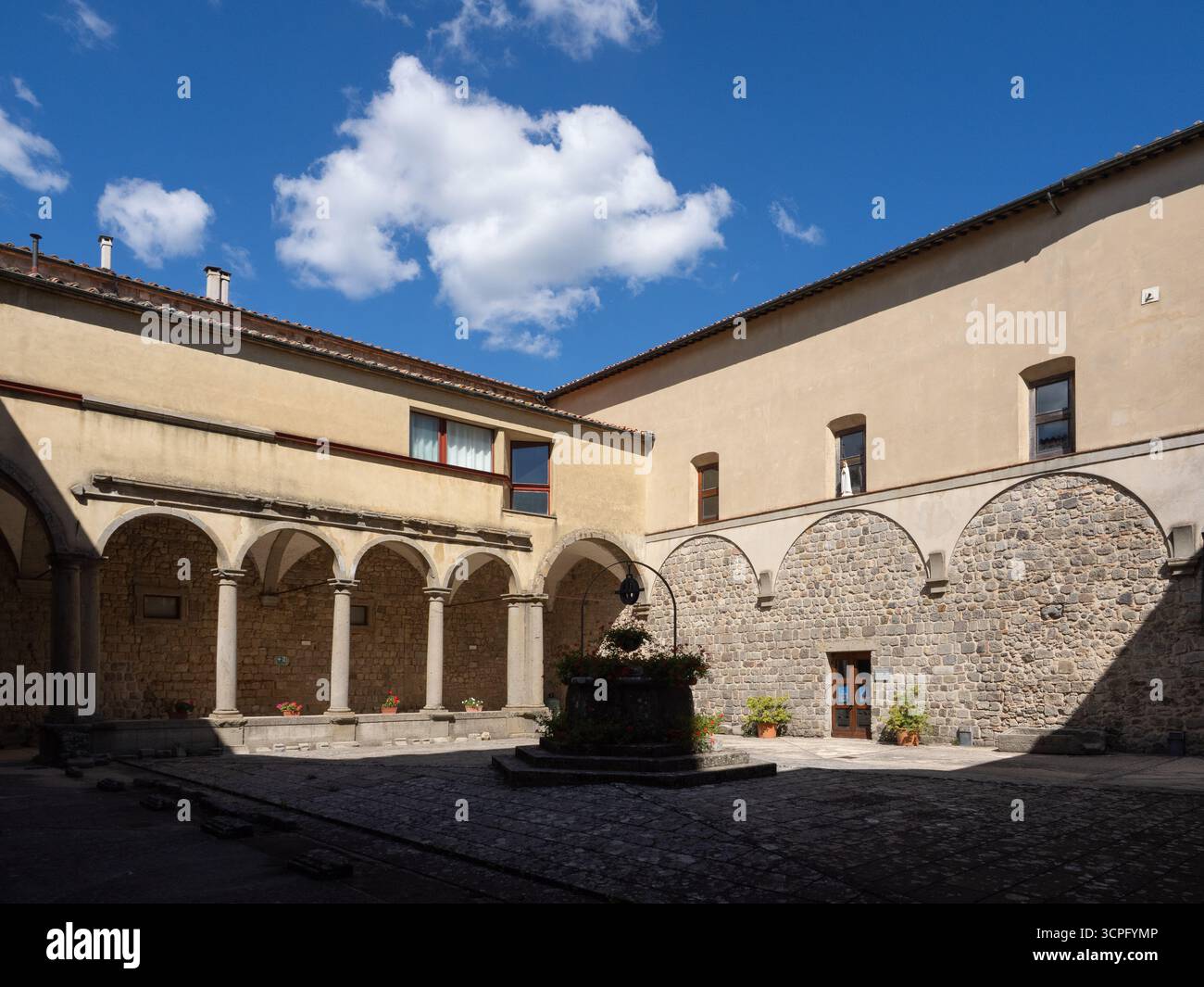 Cloister of Abbazia di San Salvatore, romanesque styled medieval church ...