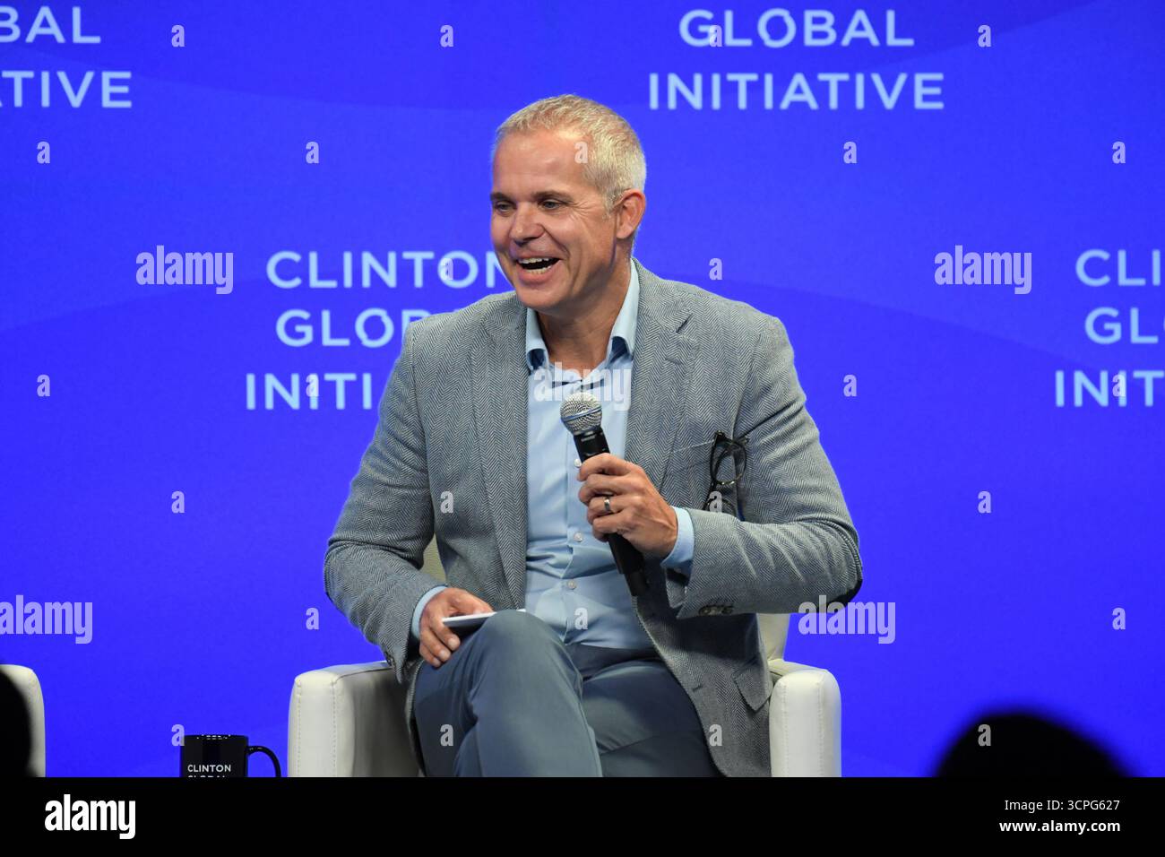 Open For Business CEO Ken Janssens onstage at the Clinton Global ...