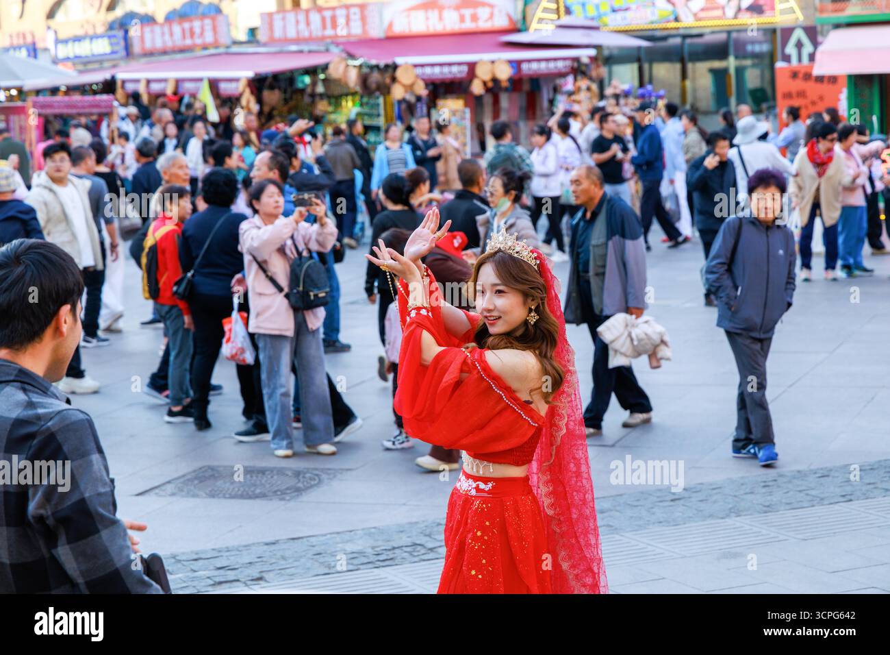 Tourists visit the Grand Bazaar in Urumqi City, northwest China's ...