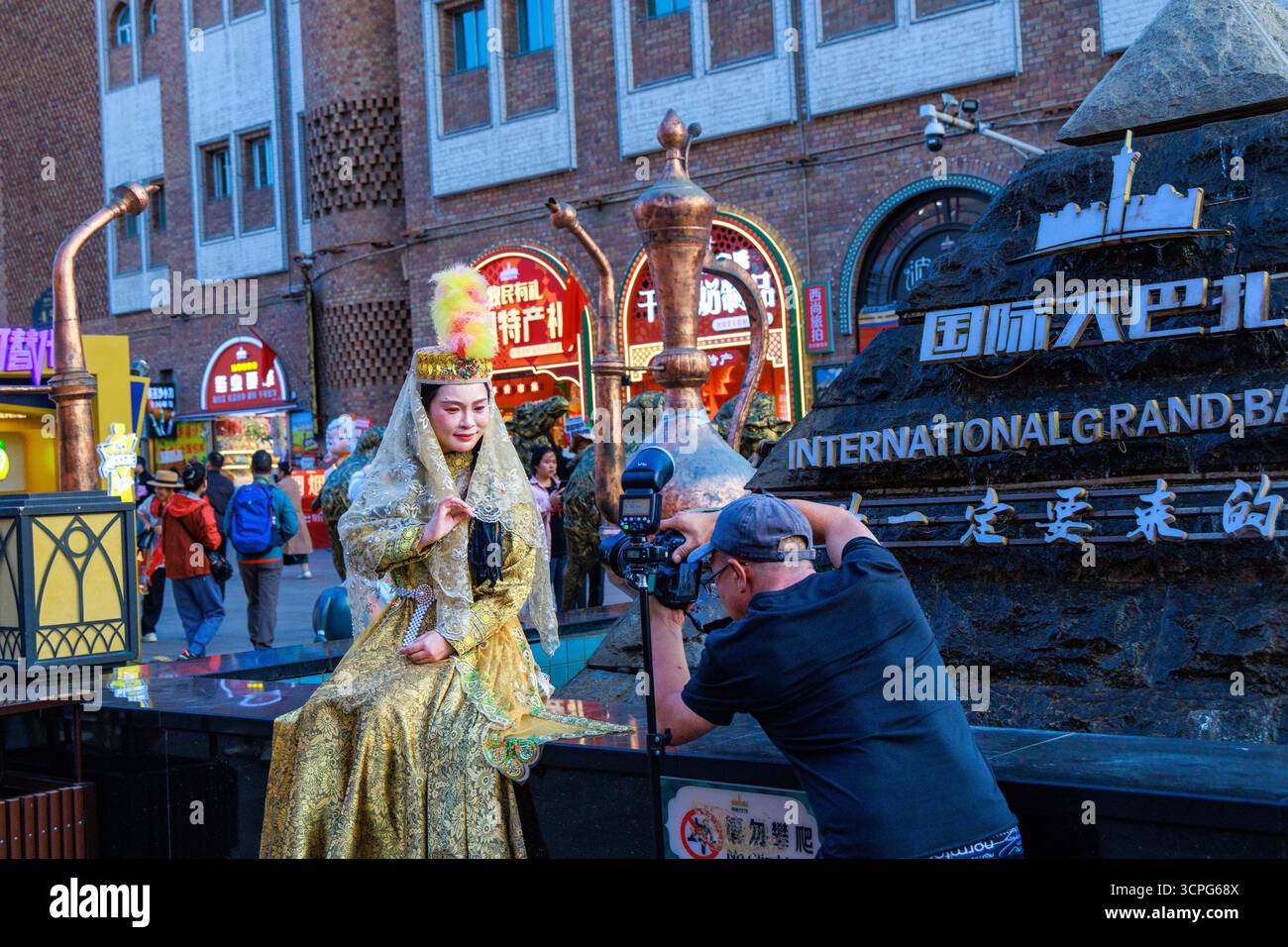 Tourists visit the Grand Bazaar in Urumqi City, northwest China's ...
