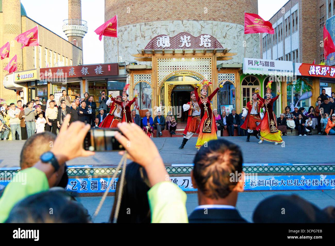 Tourists visit the Grand Bazaar in Urumqi City, northwest China's ...