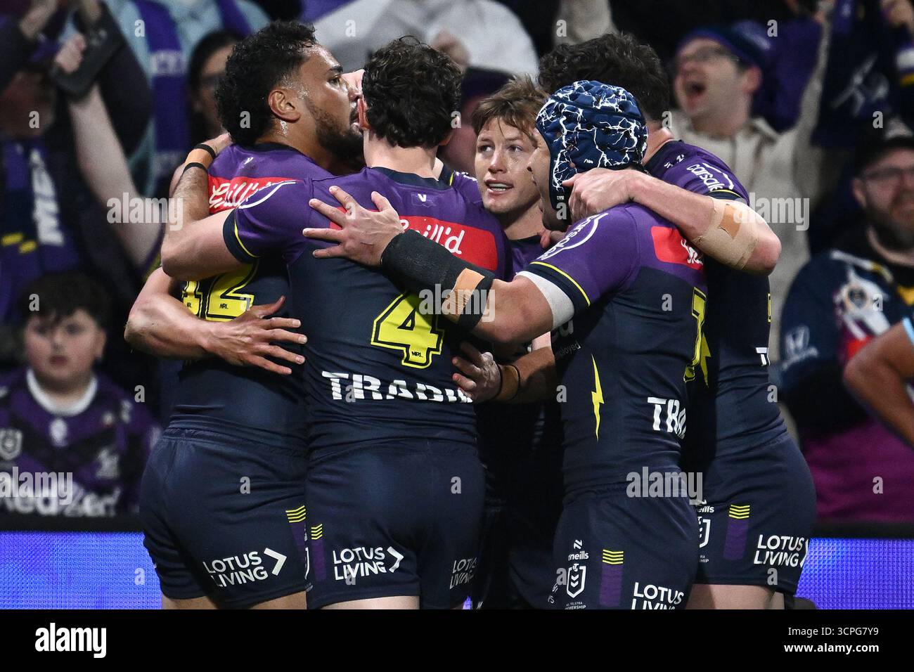Will Warbrick of the Storm celebrates scoring a try during the NRL ...