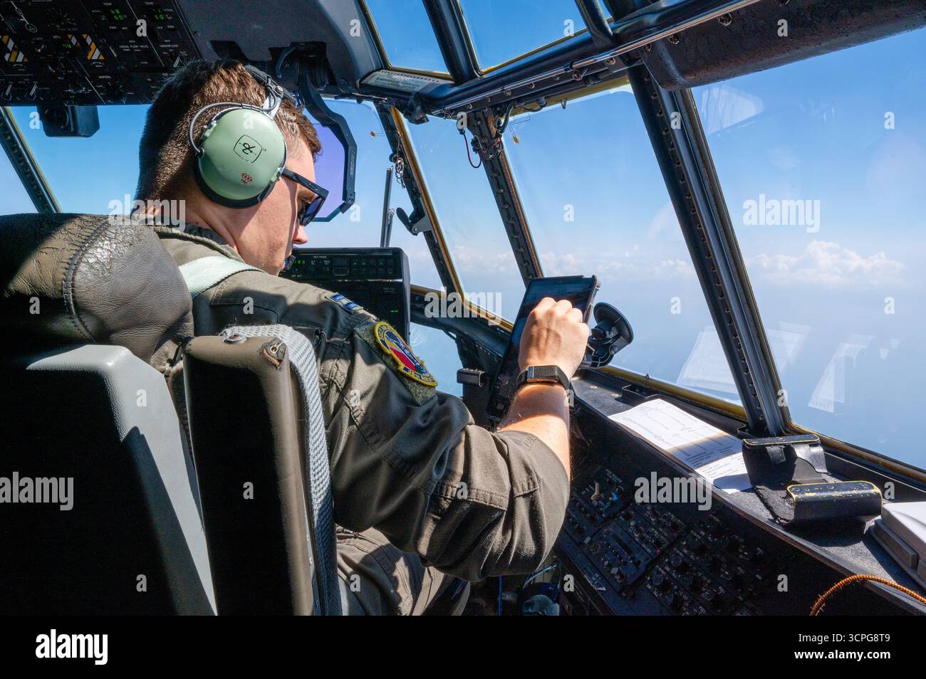 U.S. Air Force Capt. Tyler Jones, 36th Airlift Squadron pilot, flies a ...