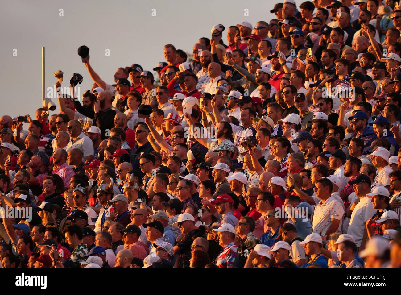 Fans wait for the start on the first hole at Bethpage Black golf course ...