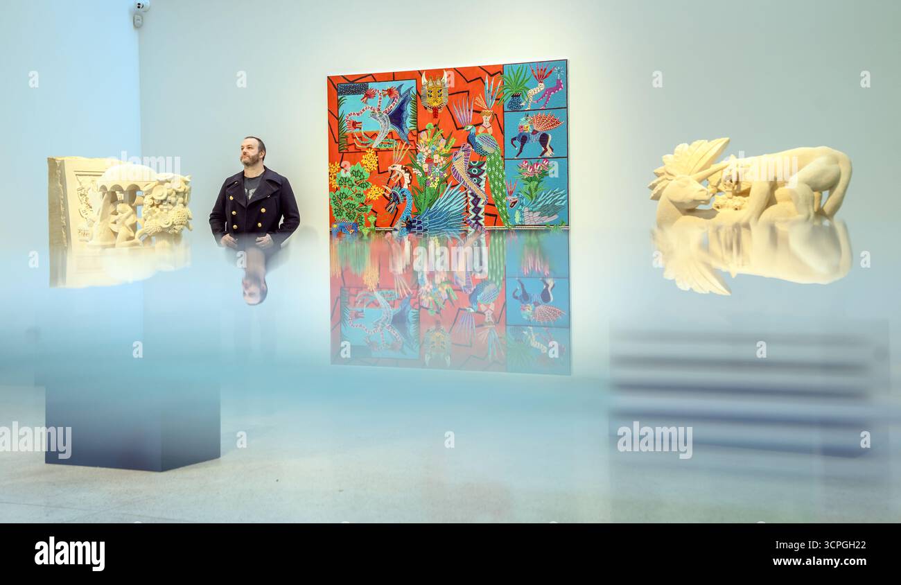 Artist Jordy Kerwick with his work, part of 'Jordy Kerwick: One To Give ...