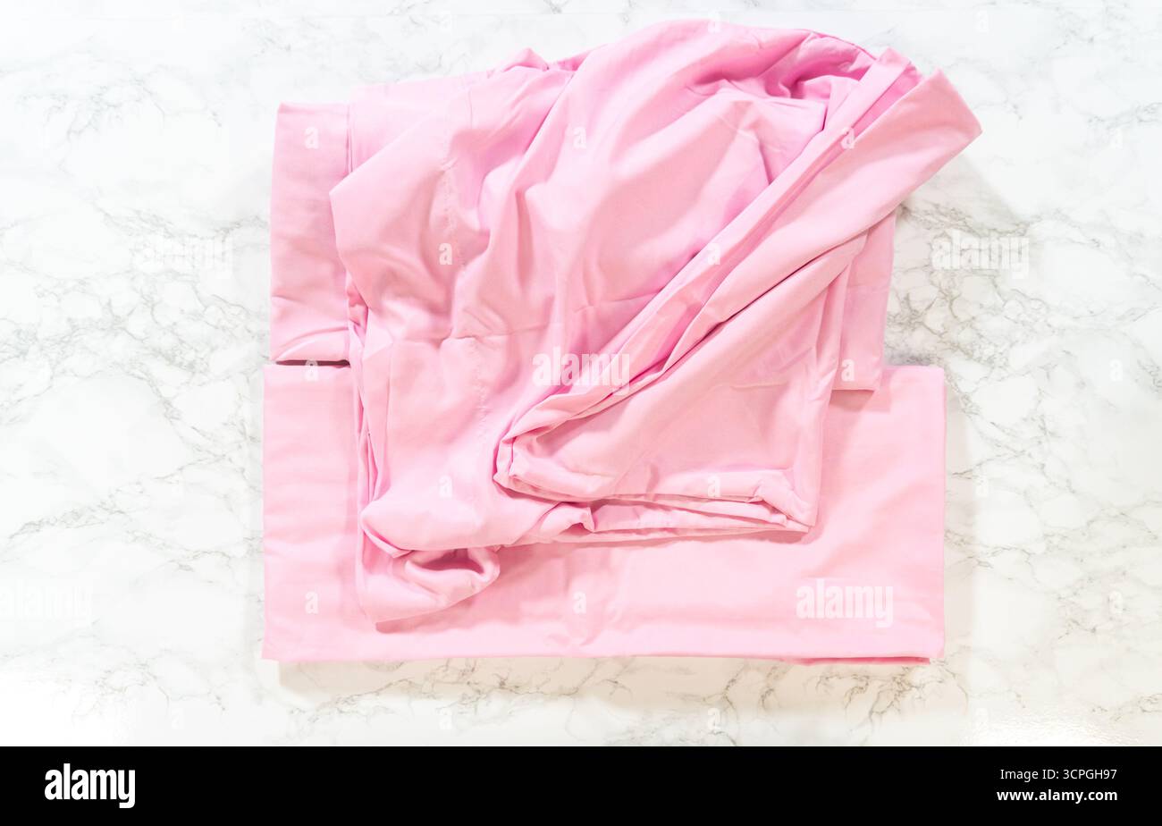 Unfolded and Partially Wrinkled Pink Sheet Stock Photo - Alamy