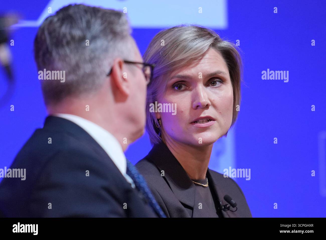 Iceland Prime Minister Kristrún Mjöll Frostadóttir, right, speaks with ...