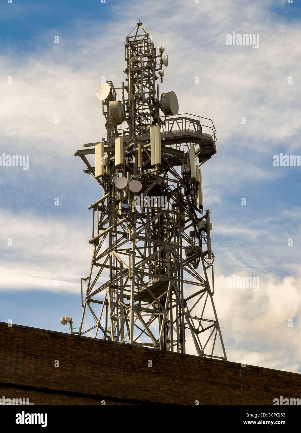 Modern telecommunications mast multiple antennas hi-res stock ...