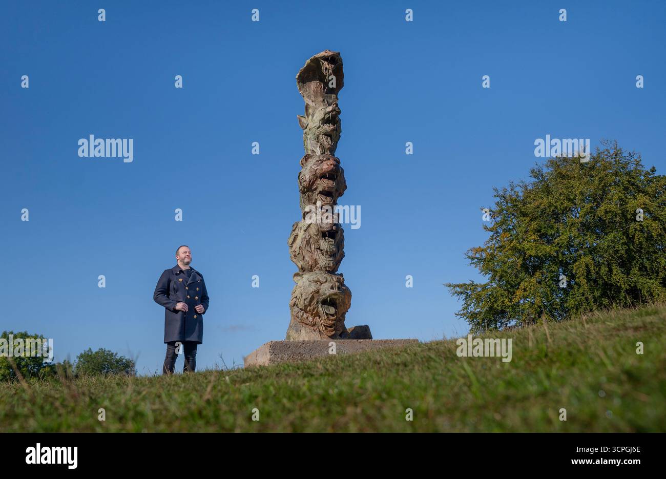 Artist Jordy Kerwick with his work, part of 'Jordy Kerwick: One To Give ...